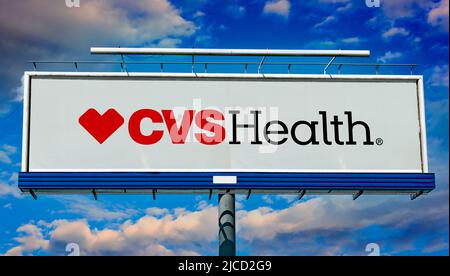 Advertisement billboard displaying logo of CVS Health Corp Stock Photo ...