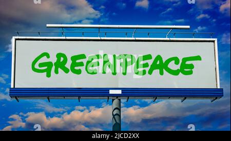 Advertisement billboard displaying logo of Greenpeace Stock Photo - Alamy