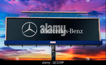 Advertisement billboard displaying logo of Mercedes-Benz Stock Photo ...