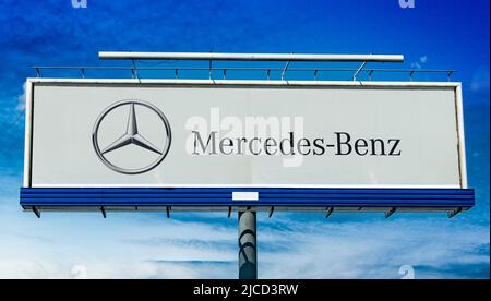 Advertisement billboard displaying logo of Mercedes-Benz Stock Photo ...