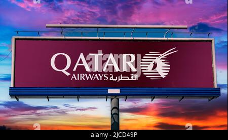 Advertisement billboard displaying logo of Qatar Airways Stock Photo ...