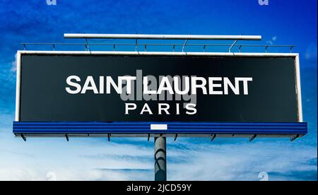 Advertisement billboard displaying logo of Yves Saint Laurent Stock ...