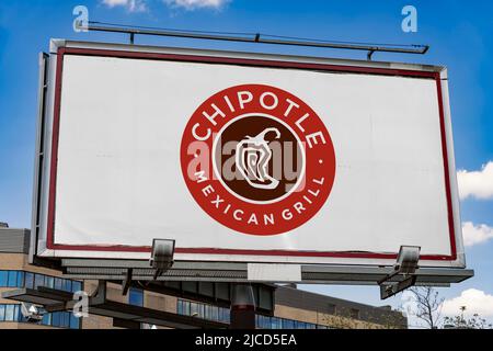 Advertisement billboard displaying logo of Chipotle Stock Photo - Alamy