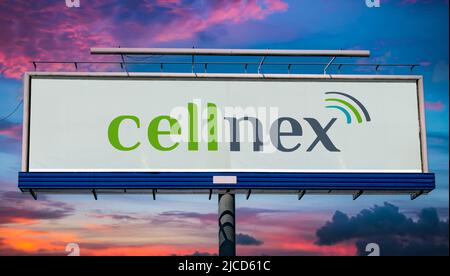 Advertisement billboard displaying logo of Cellnex Telecom Stock Photo ...