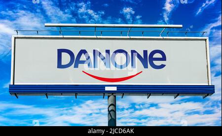 Advertisement billboard displaying logo of Danone Stock Photo - Alamy