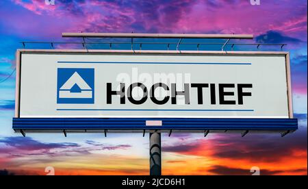 Advertisement billboard displaying logo of Hochtief Stock Photo - Alamy