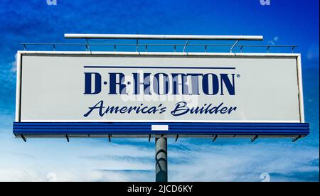 Advertisement billboard displaying logo of D.R. Horton Stock Photo - Alamy