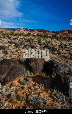 Volcanic bombs, molten lava from an ancient volcano, CANYONLANDS, Utah ...