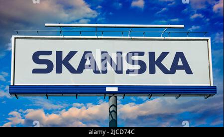 Advertisement billboard displaying logo of Skanska Stock Photo - Alamy