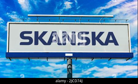 Advertisement billboard displaying logo of Skanska Stock Photo - Alamy