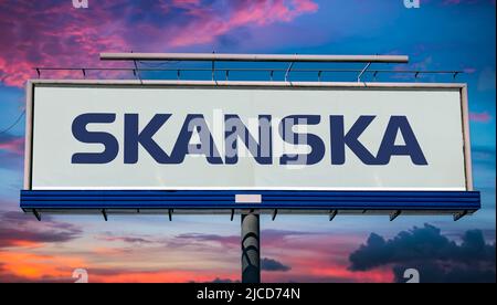 Advertisement billboard displaying logo of Skanska Stock Photo - Alamy