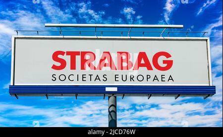 Advertisement billboard displaying logo of STRABAG Stock Photo - Alamy