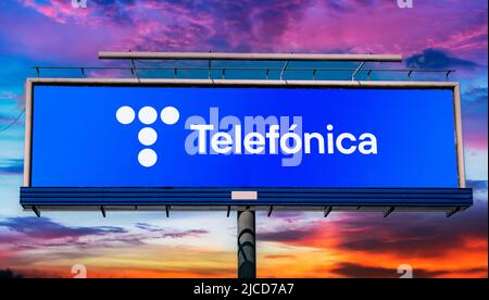 Advertisement billboard displaying logo of Telefonica Stock Photo - Alamy