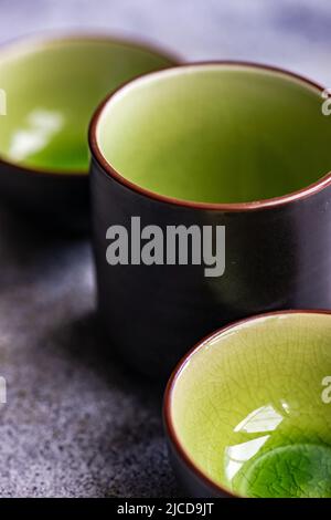 Round geometric green ceramic shapes on concrete background Stock Photo ...