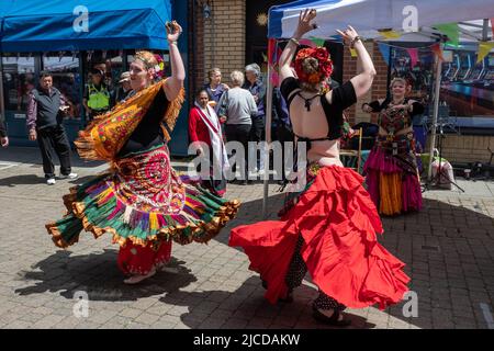 Dancers in colourful costumes performing traditional Huayno Cusqueño ...