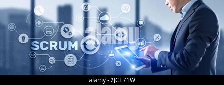 SCRUM. Hand presses the inscription scrum on a virtual panel. Agile ...