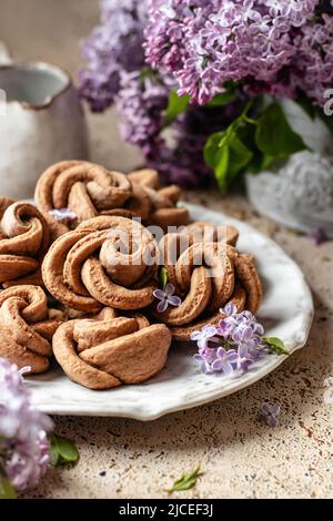 Homemade cottage cheese shortbread cookies shape rose on a platter ...
