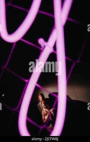 happy bride and groom, neon sign Stock Photo - Alamy