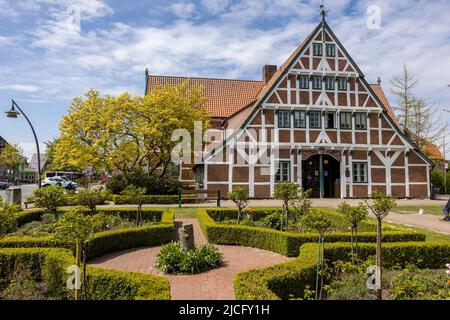 The town hall in Jork in the Alte Land in spring during apple blossom ...