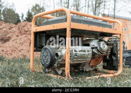 portable gasoline generator operating on a construction site Stock ...