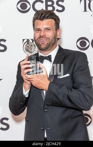 Gareth Owen poses in the press room with the award for best sound ...
