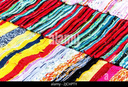 Creative background from handmade doormats. Texture of a homespun rug ...
