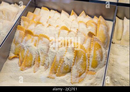 Italian food, handmade mezzaluna pasta ravioli stuffed with four ...