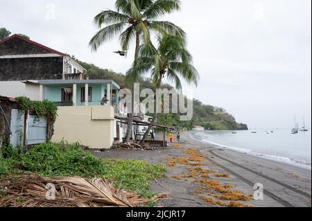 Saint Pierre, France. 29th Apr, 2022. A fishing boat lies on the beach ...