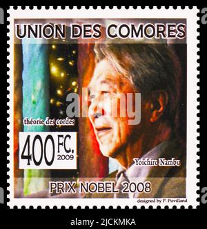 University of Chicago professor Yoichiro Nambu walks to a news ...