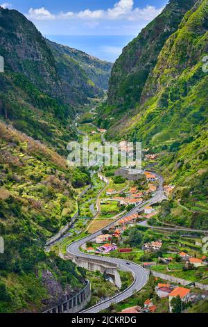 Aerial view of the road in mountain valley in Dolomites, Italy. Top ...