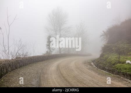 Guizhou digging 24 turn off in the fog Stock Photo - Alamy