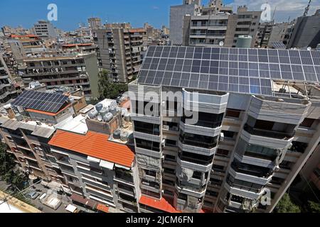 Beirut. 14th June, 2022. Solar panels are seen over the Beirut River in ...
