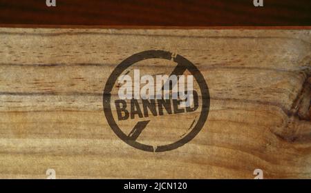 Banned stamp printed on wooden box. Ban, restricted and prohibited ...