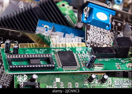 stack with various computer electrical boards and components, Repairing ...