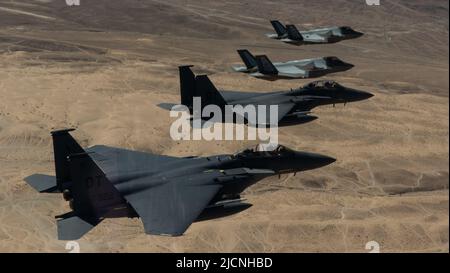 Lt. Col. Brandon Nauta, 65th Aggressor Squadron commander, assumes ...