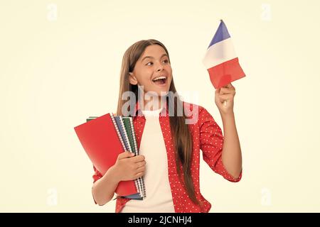 travel to france. learn foreign language. surprised teen girl hold ...