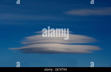 A lenticular cloud forms over the Amerian Southwest near Santa Fe, New ...