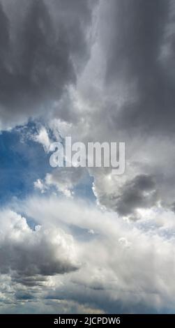Fantastic soft thunderclouds, natural sky composition, vertical ...