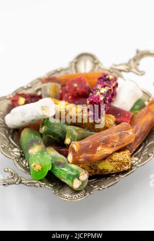 Turkish delight varieties in an iron bowl. Traditional Turkish ...