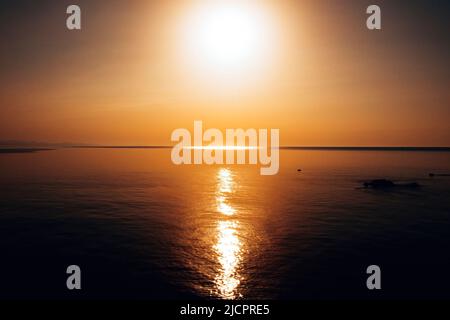 sunset at sea. variety of colors and hues of the rising sun. . High ...