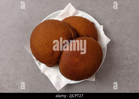 Mocha Buns with Coffee and Cream Stock Photo - Alamy