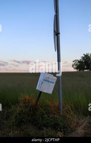 Falling mailbox at sunset Stock Photo - Alamy