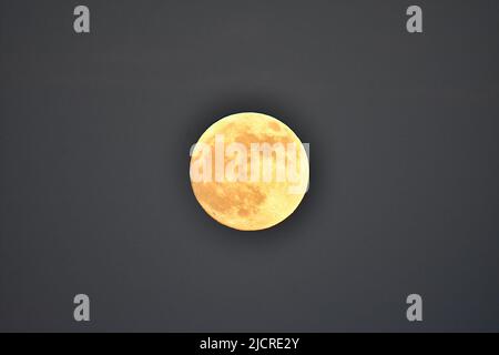 Strawberry full moon in Marseille, France Stock Photo - Alamy