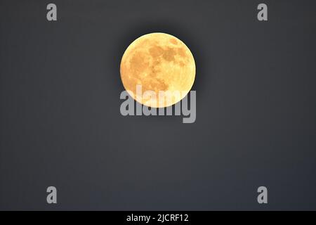 Strawberry full moon in Marseille, France Stock Photo - Alamy