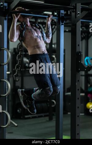 Horizontal weight chain athlete bar man muscular power fitness exercise ...