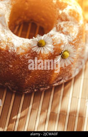 Cupcake decorated chamomile flower In the rustic style. Authentic photo ...