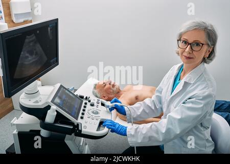 Sonographer working with patients Stock Photo - Alamy