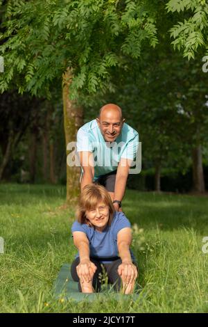 Fitness, yoga and old man with stretching in class for physical ...