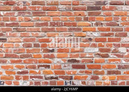 Old red bricks wall with an original design Stock Photo - Alamy