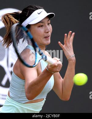 Wang Xinyu of China plays a forehand return to Linda Noskova of the ...